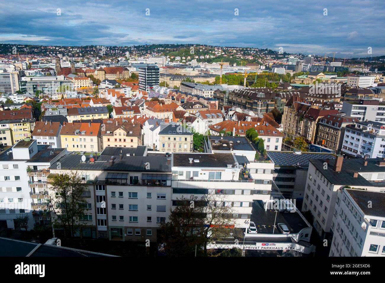 The city skyline, clear sky, generic layout with nature, trees. In ...