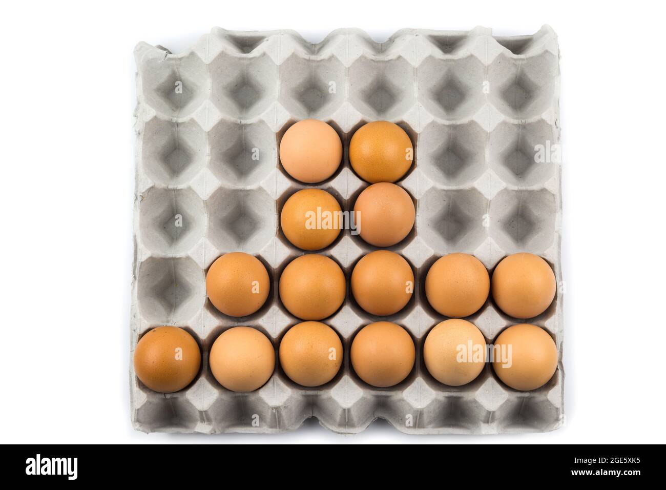 Eggs arranged in a number isolated on white background Stock Photo - Alamy