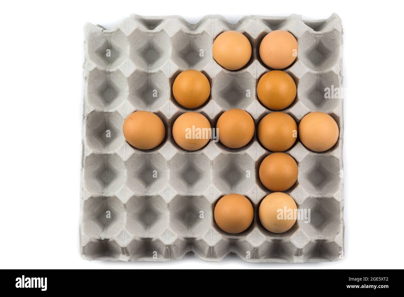 Eggs arranged in a number isolated on white background Stock Photo - Alamy