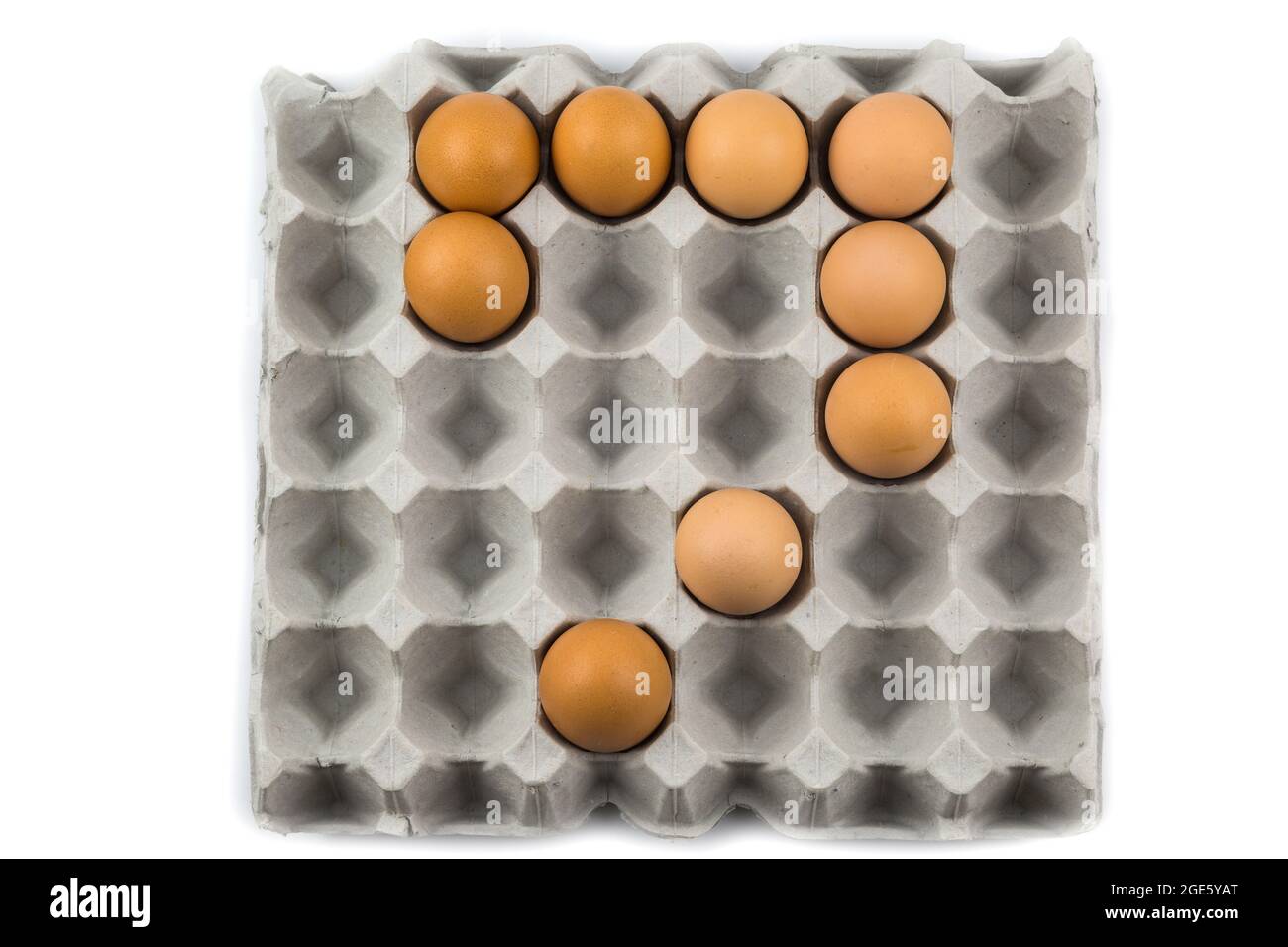 Eggs arranged in a number isolated on white background Stock Photo - Alamy