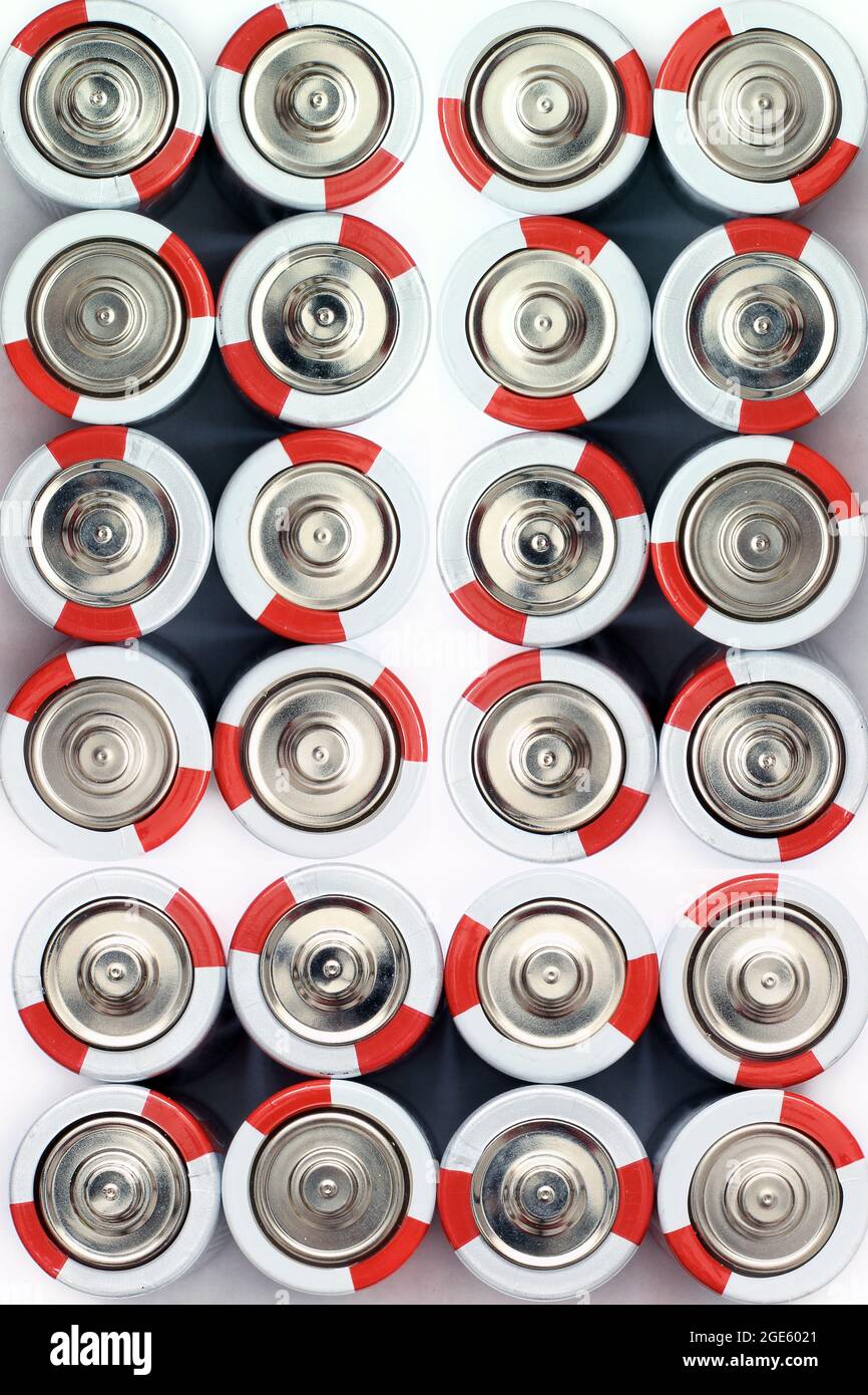 Small batteries background Stock Photo - Alamy