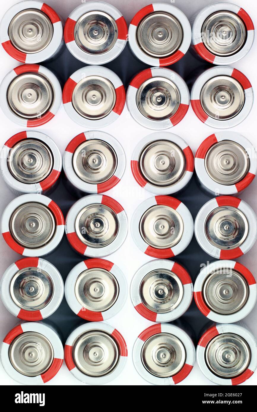 Small batteries background Stock Photo - Alamy