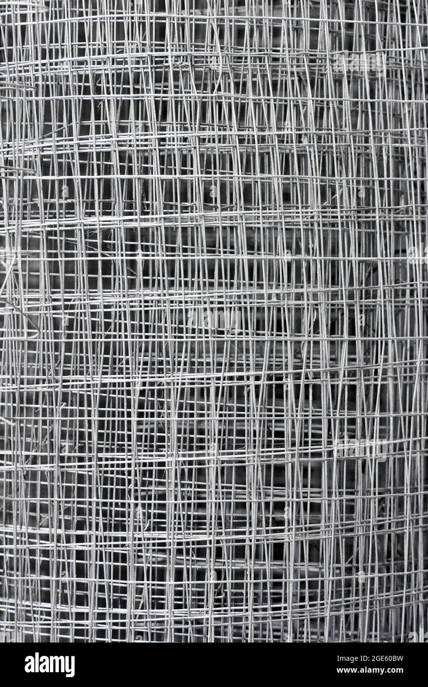 Roll of mesh. Metal grid. Construction material Stock Photo - Alamy