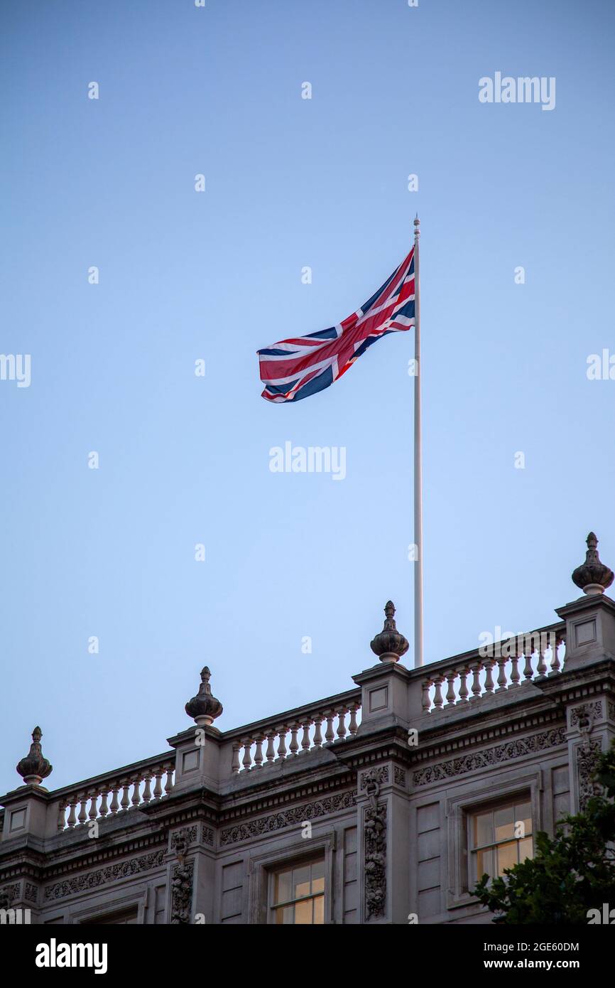 Union Jack on Whitehall Building at Twilight - London UK Stock Photo ...