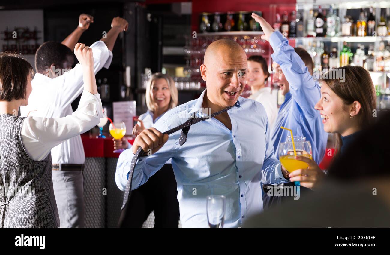 Co workers dancing hi-res stock photography and images - Alamy