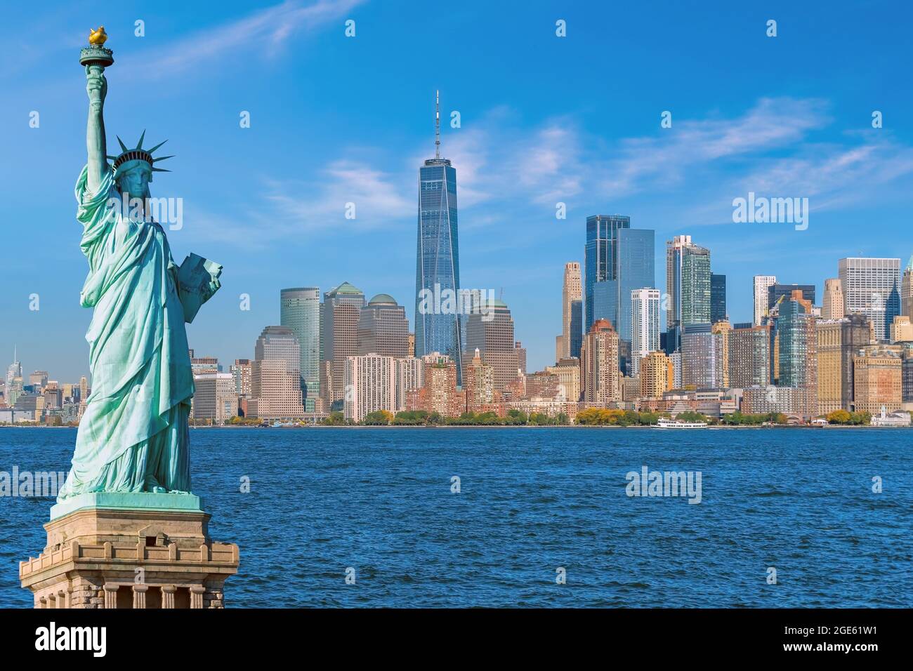 The Statue of Liberty with Manhattan city skyline background, Landmarks ...