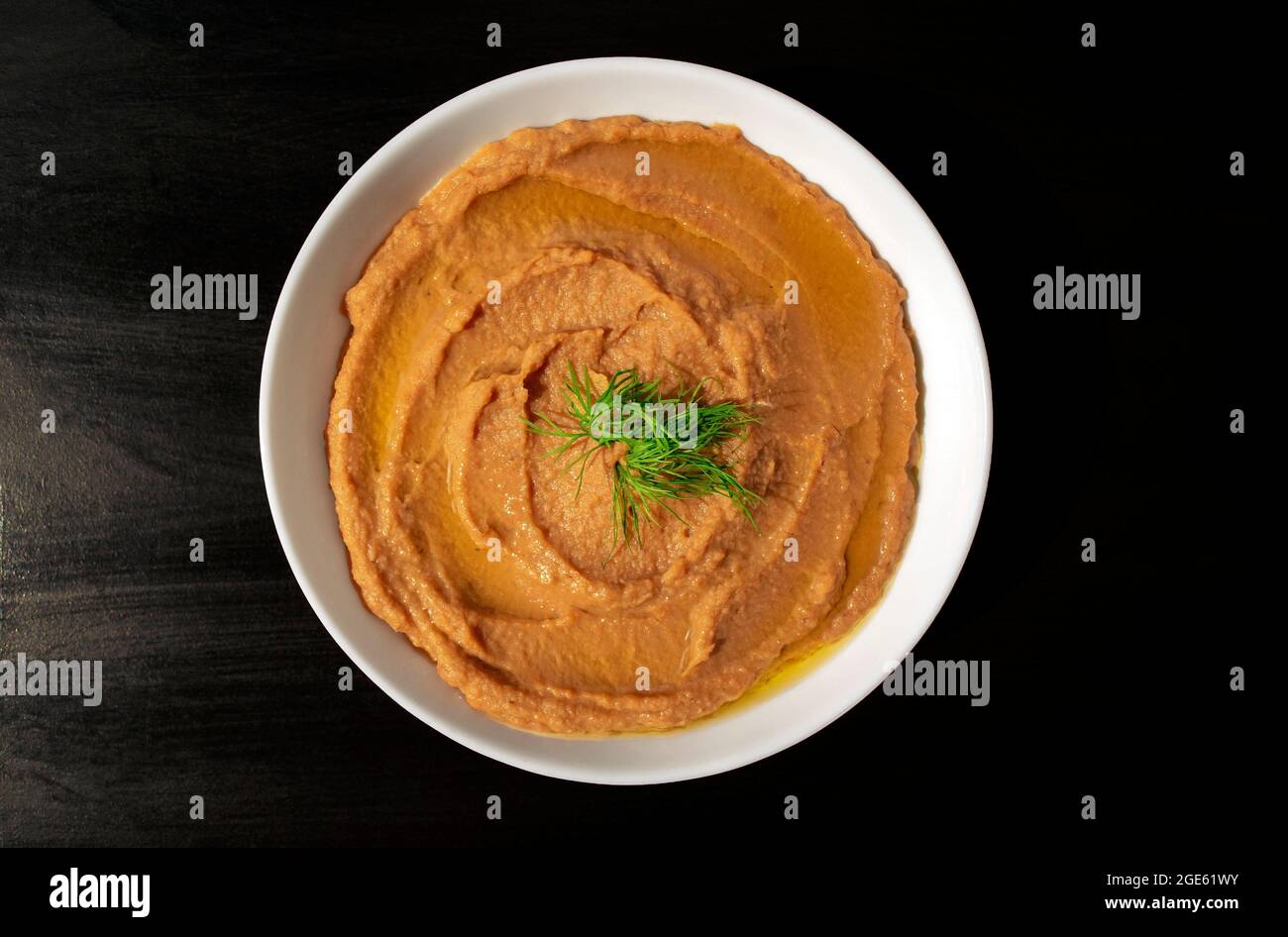 Famous traditional Arabic cuisine - peeled fava beans mashed plain in a ...