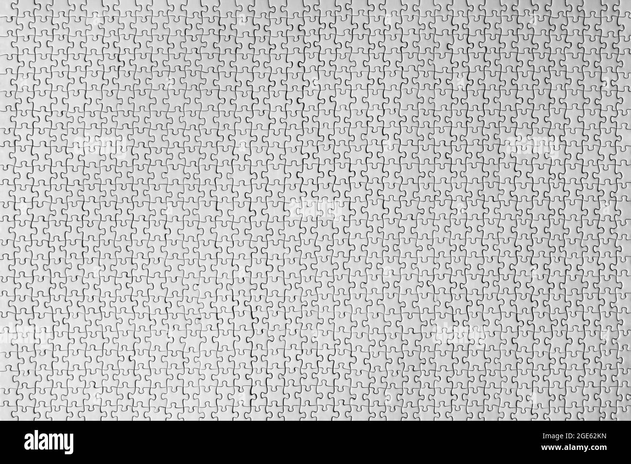 White jigsaw puzzle texture background Stock Photo - Alamy