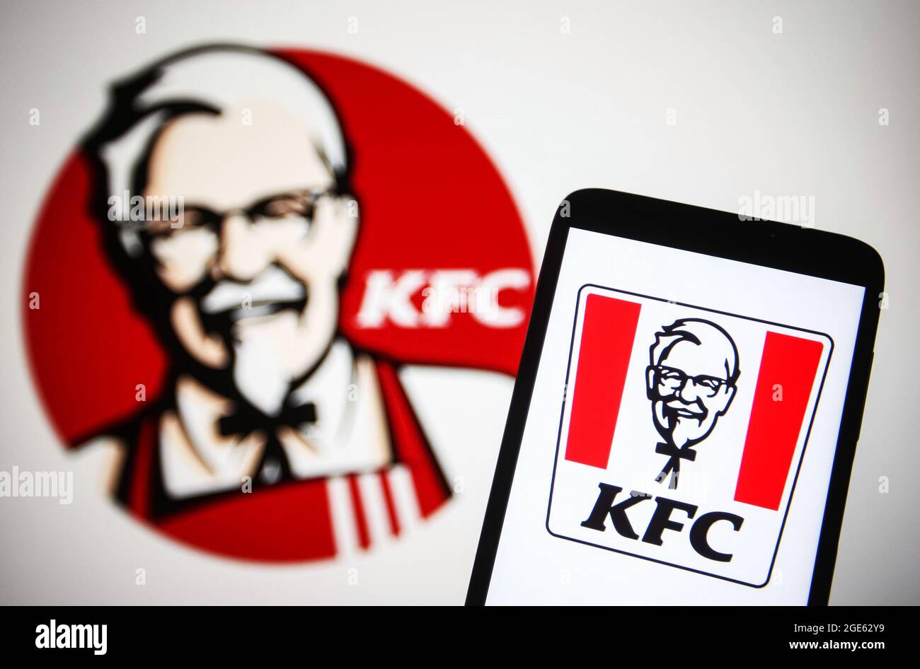 In this photo illustration a KFC (Kentucky Fried Chicken) logo is seen ...