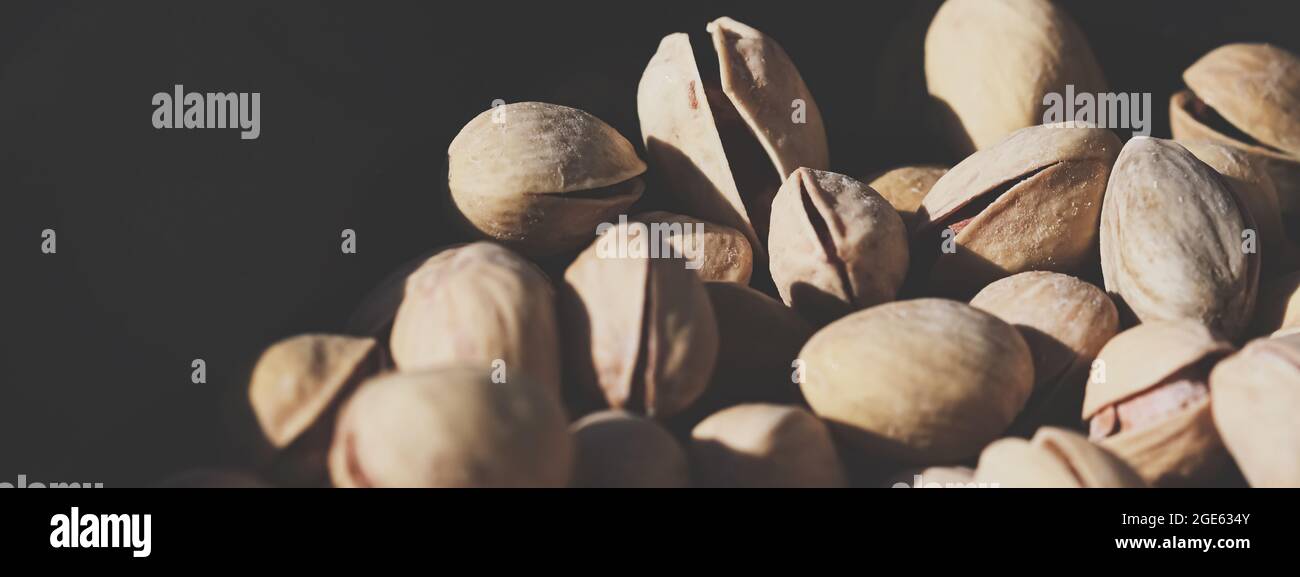 Organic pistachios in the sun, healthy food and snack background Stock ...