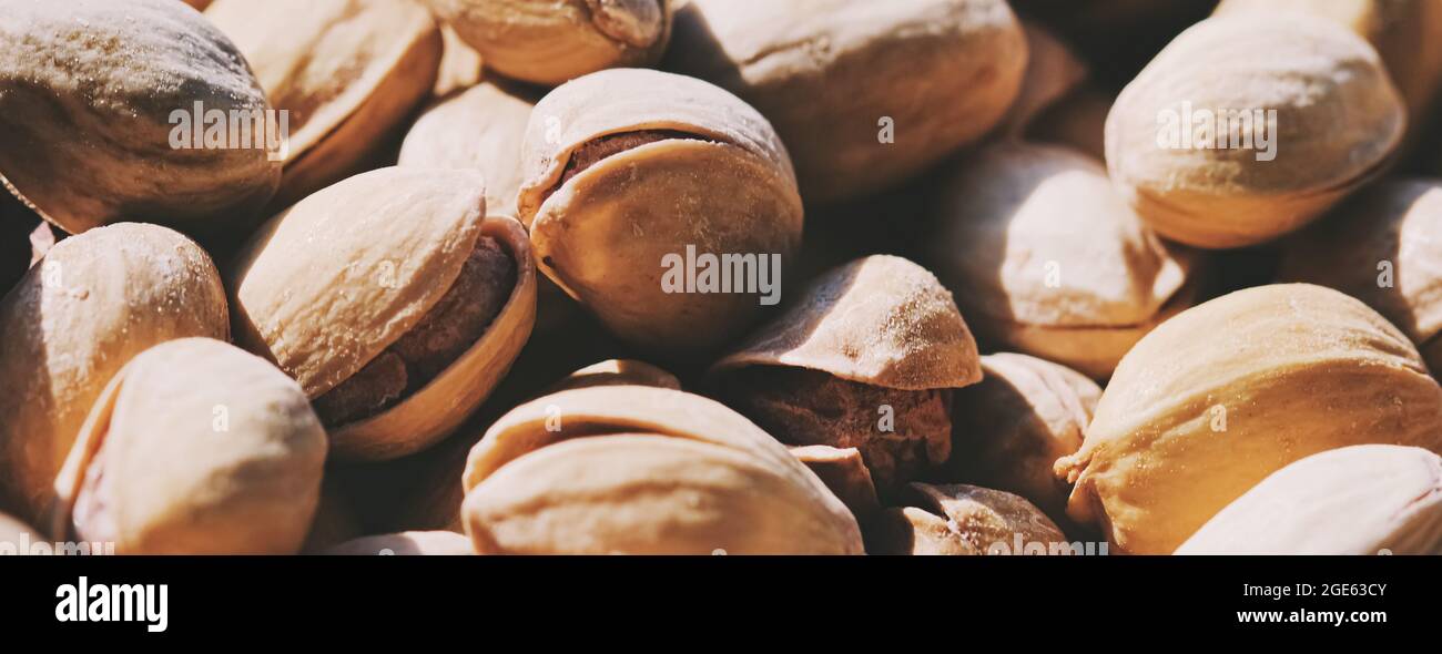Organic pistachios in the sun, healthy food and snack background Stock ...