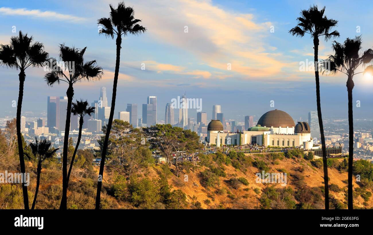 The Griffith Observatory and Los Angeles city skyline at sunset CA ...