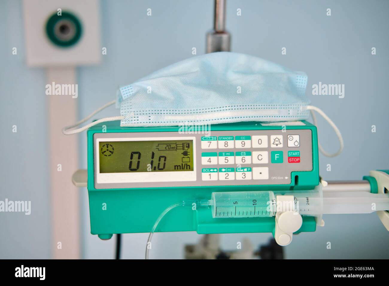 A syringe pump, a dropper for anesthesia and drug administration during ...