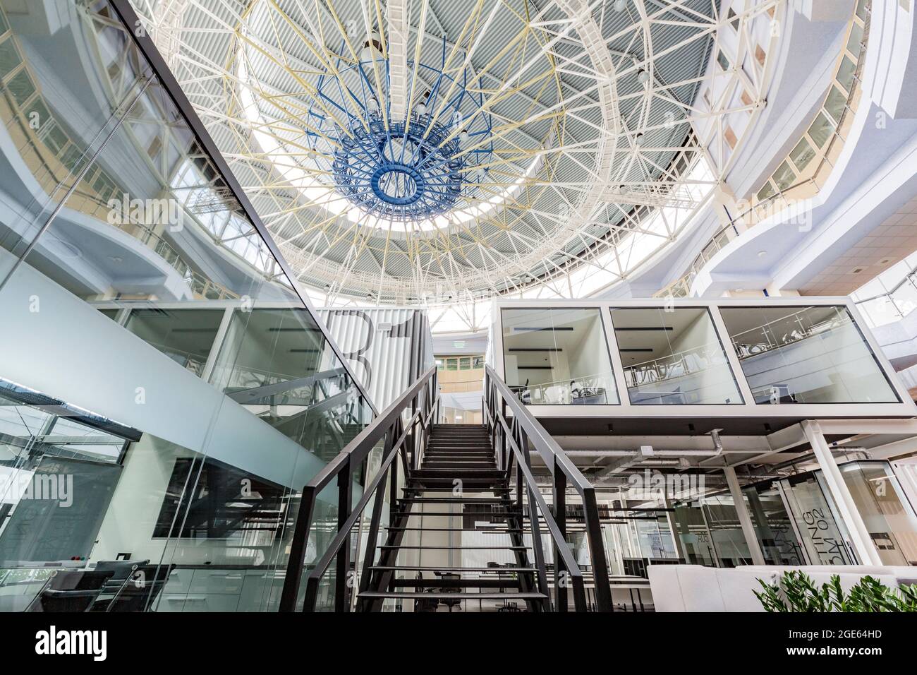 Creative business center design with private workplaces, view from ...