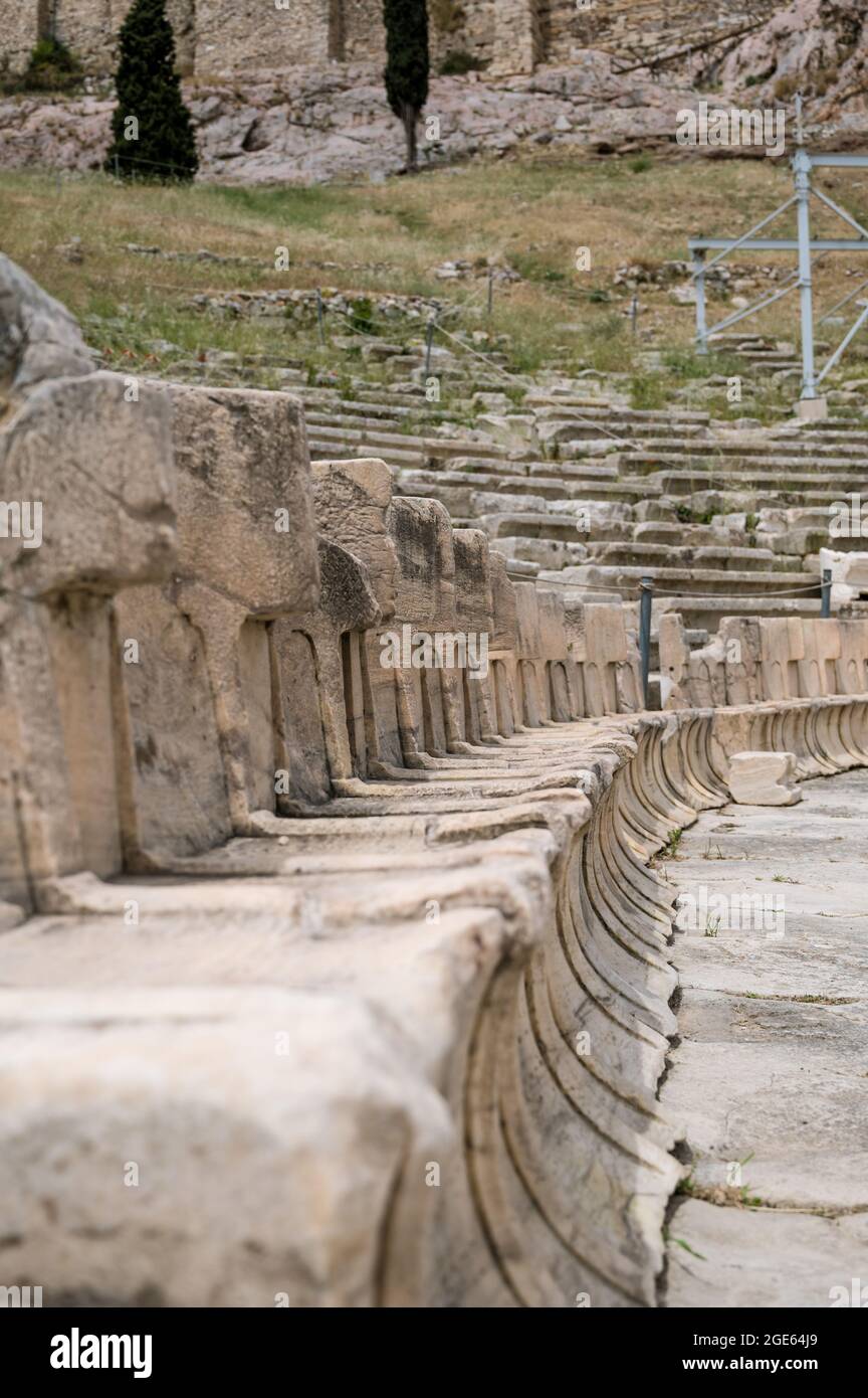 Marble chairs in ancient Greek Theatre of Dionysus on slope of ...