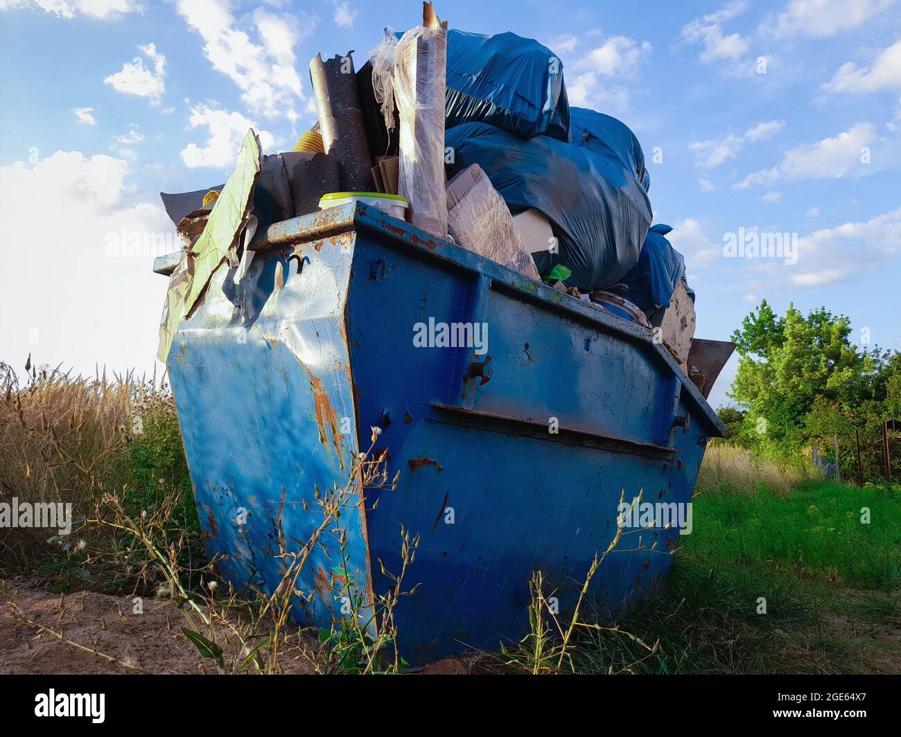 Construction trash dumpsters on metal container, house renovation Stock ...