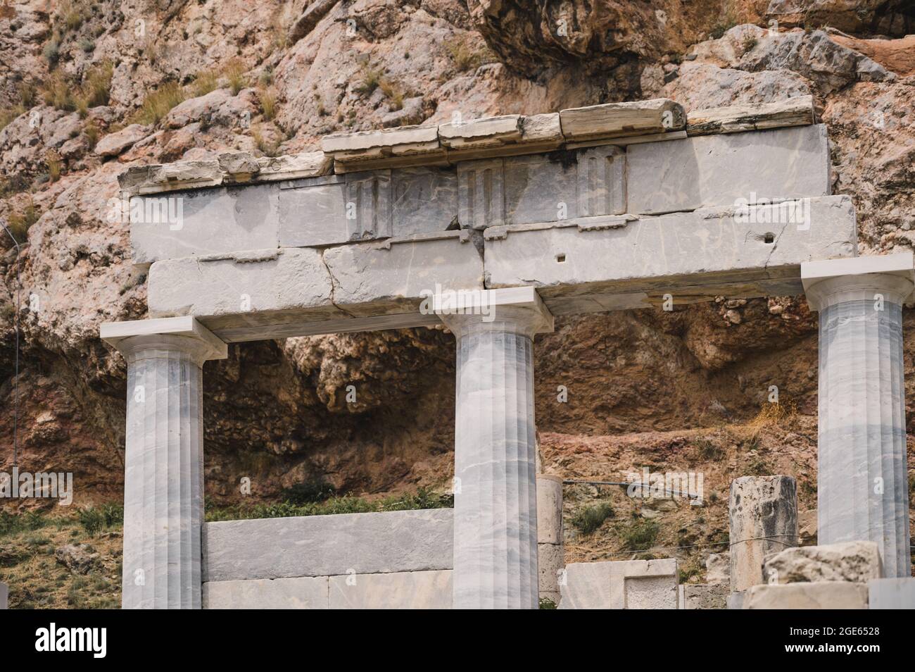 Ruins of ancient greek settlement. Remains of temple. Marble columns ...