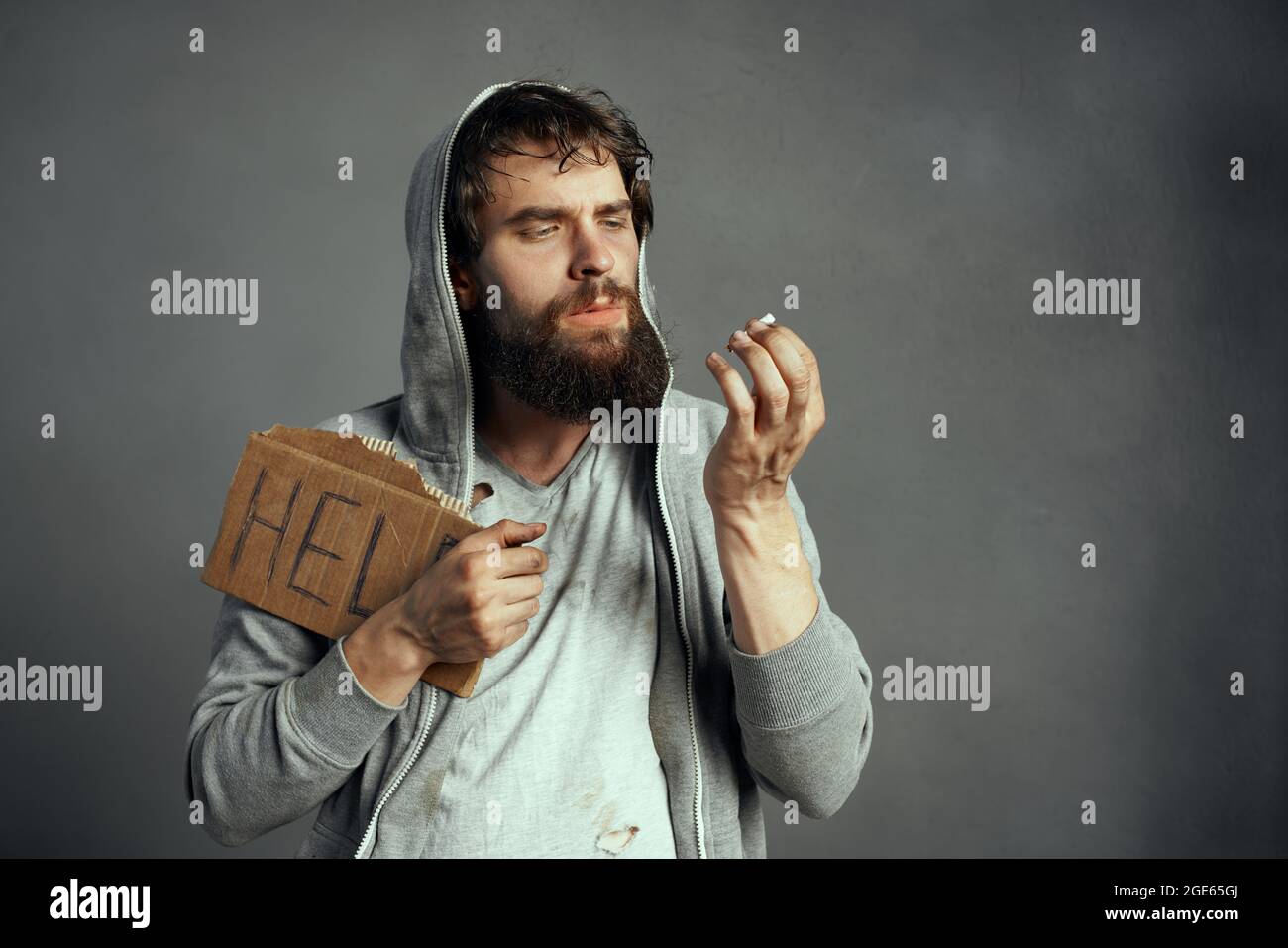 Homeless black man cigarette hi-res stock photography and images - Alamy