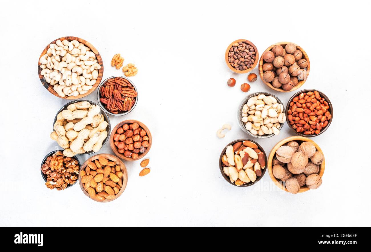 Nuts in bowls. Almonds, hazelnuts, walnuts and other. Healthy food ...
