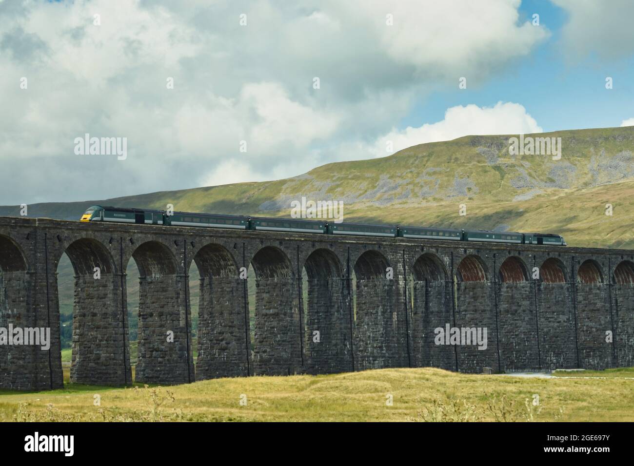 train crossing ribblehead viaduct Stock Photo - Alamy