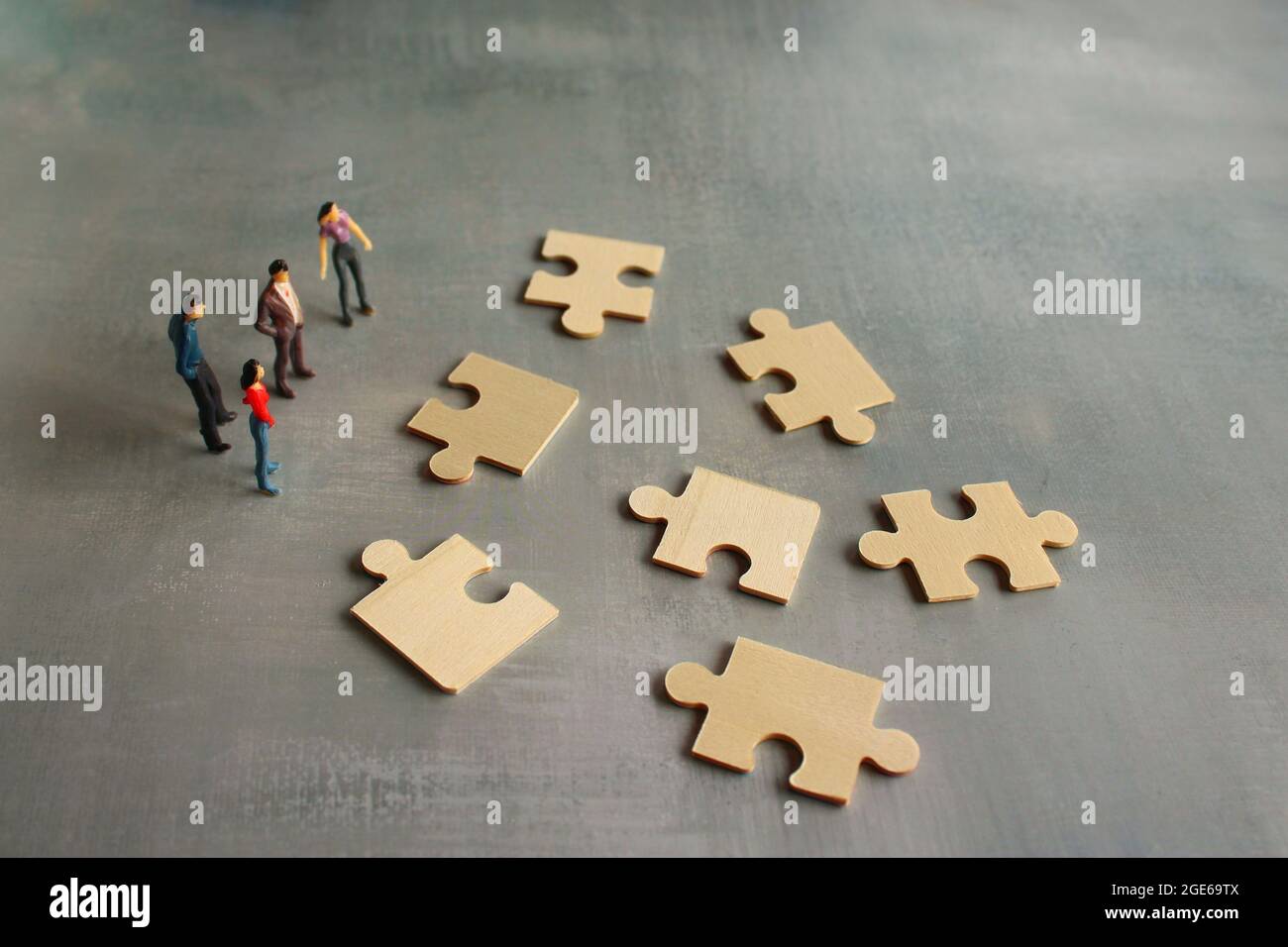 Business teamwork with scramble puzzle cooperation unity support ...
