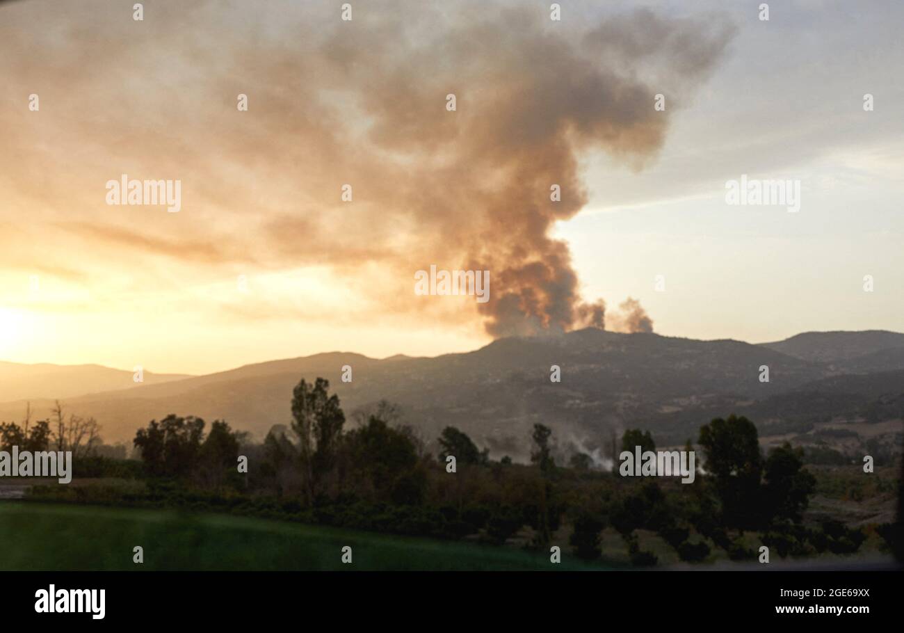 Bejaia, Kabylie region, Algeria. 16th Aug 2021. Smoke rises from forest ...