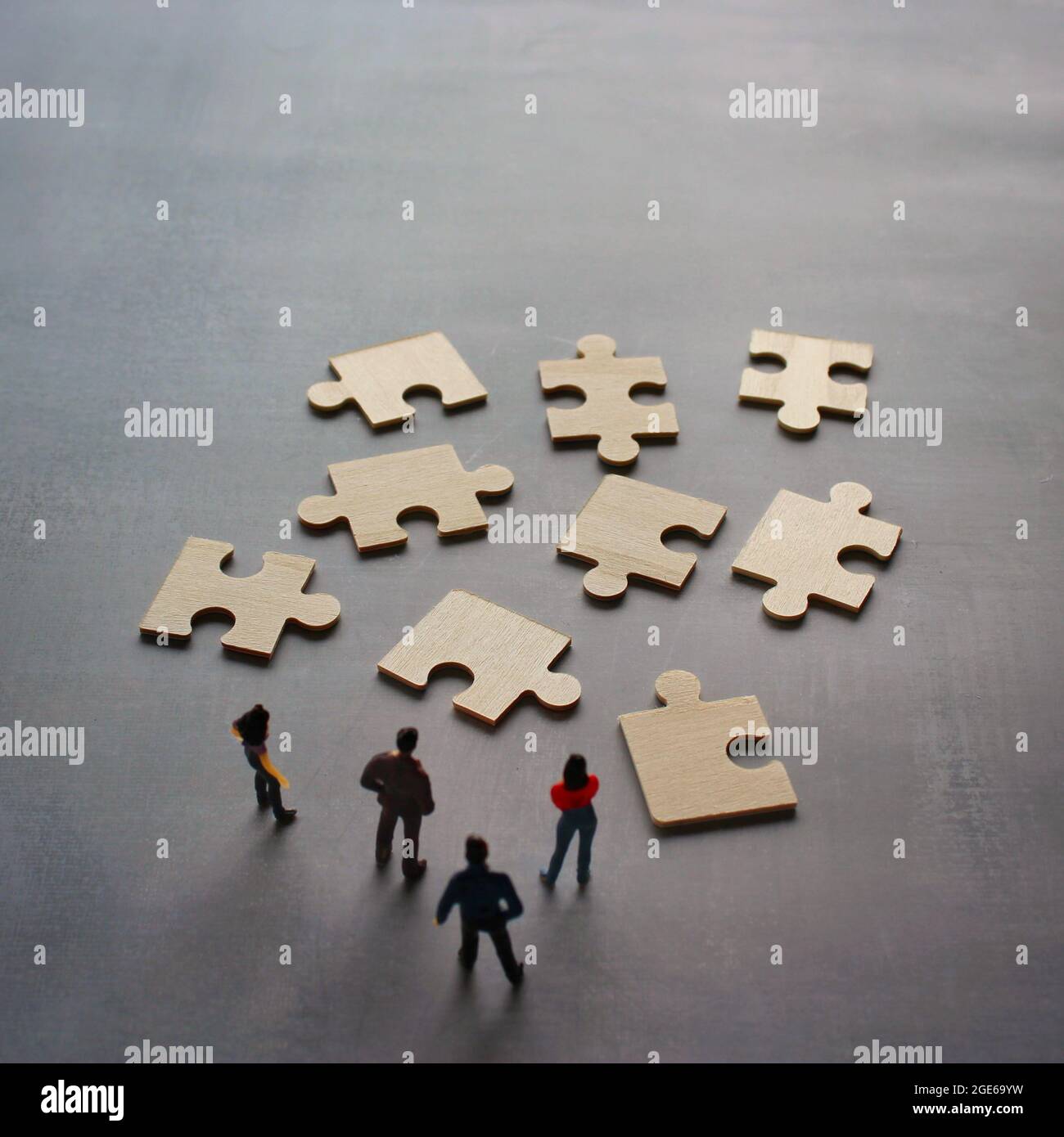 Business teamwork with scramble puzzle cooperation unity support ...