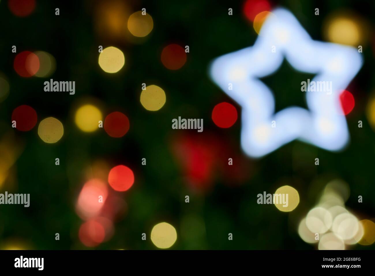 Blurred image of festive Christmas tree with decorations. Defocused ...