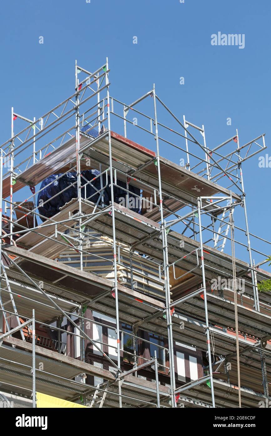 Construction site, scaffolding, house facade, roof gable, old building ...