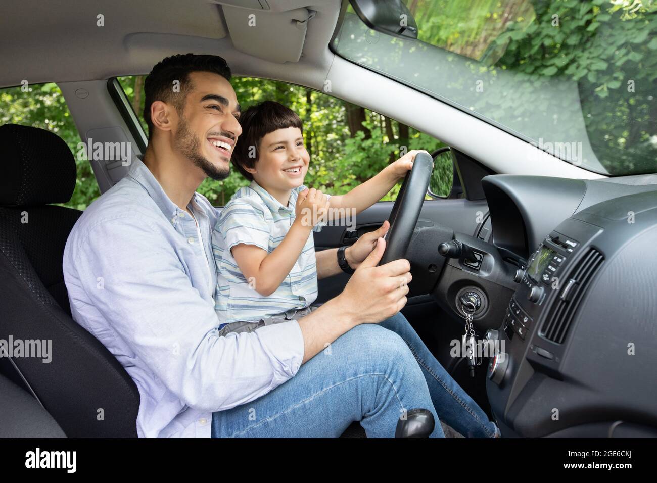 Parent teaching child drive hi-res stock photography and images - Alamy