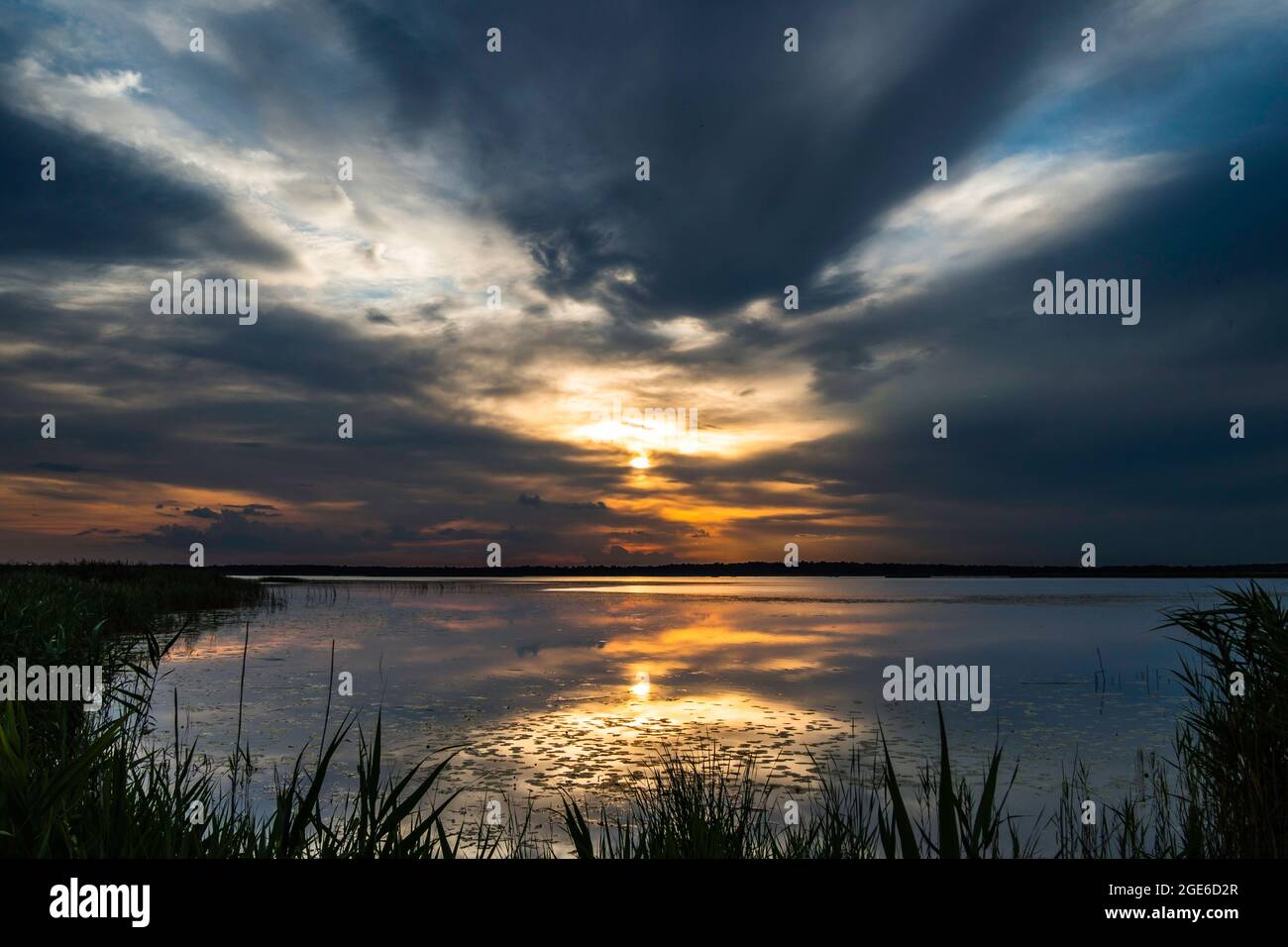 Lakeshore with Dusk Sky During the Beautiful Sunset Stock Photo - Alamy