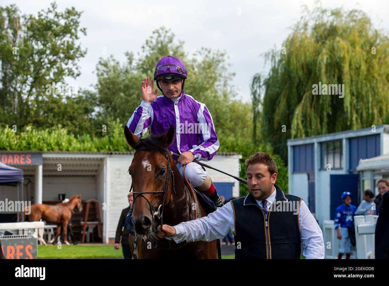 Windsor, Berkshire, UK. 16th August, 2021. Jockey Andrea Atzeni winners ...