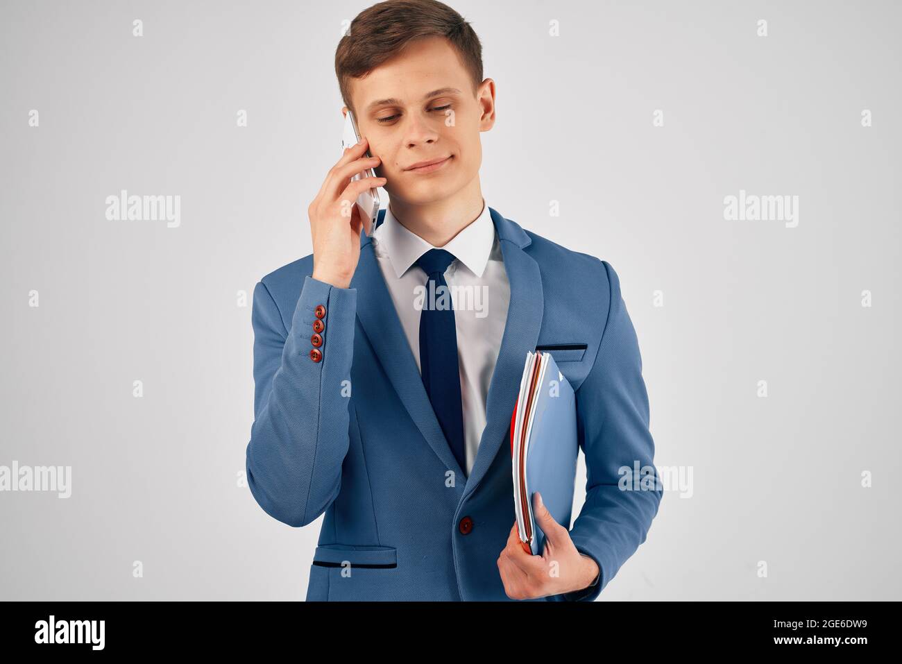 business man with blue folder talking on the phone manager professional ...
