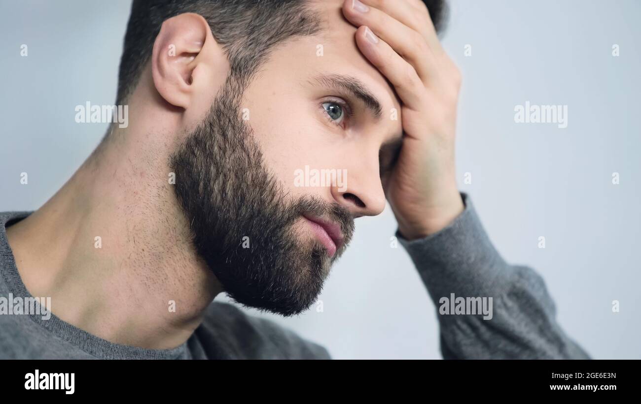 Hand touching forehead hi-res stock photography and images - Alamy