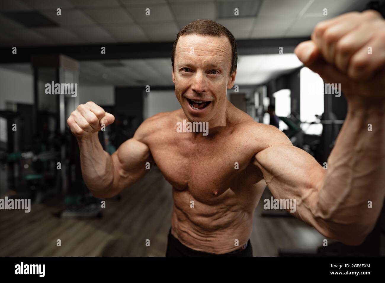 Portrait of a senior muscular man in a gym Stock Photo - Alamy