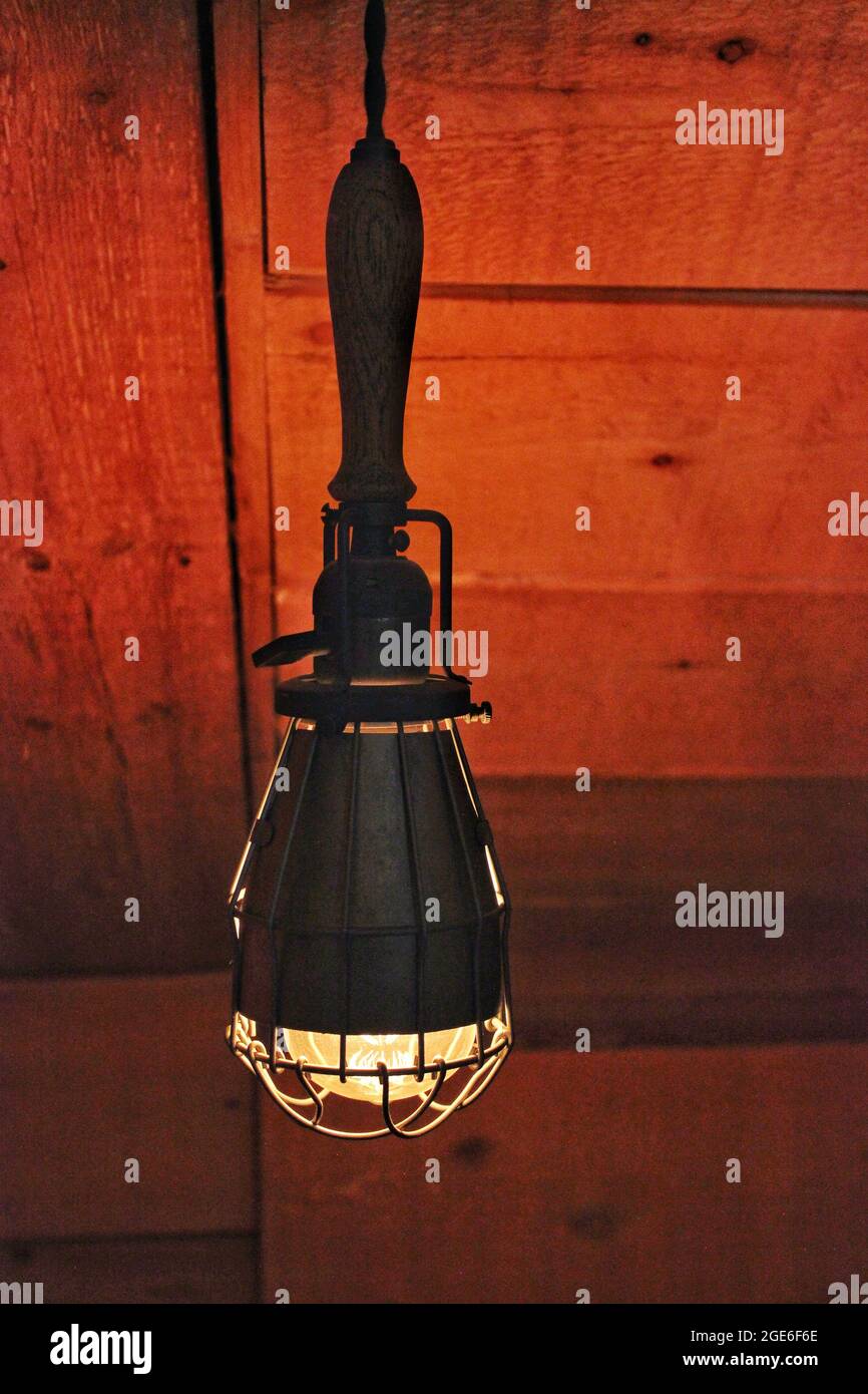 Old tool shed with vintage tools and a dim light Stock Photo - Alamy