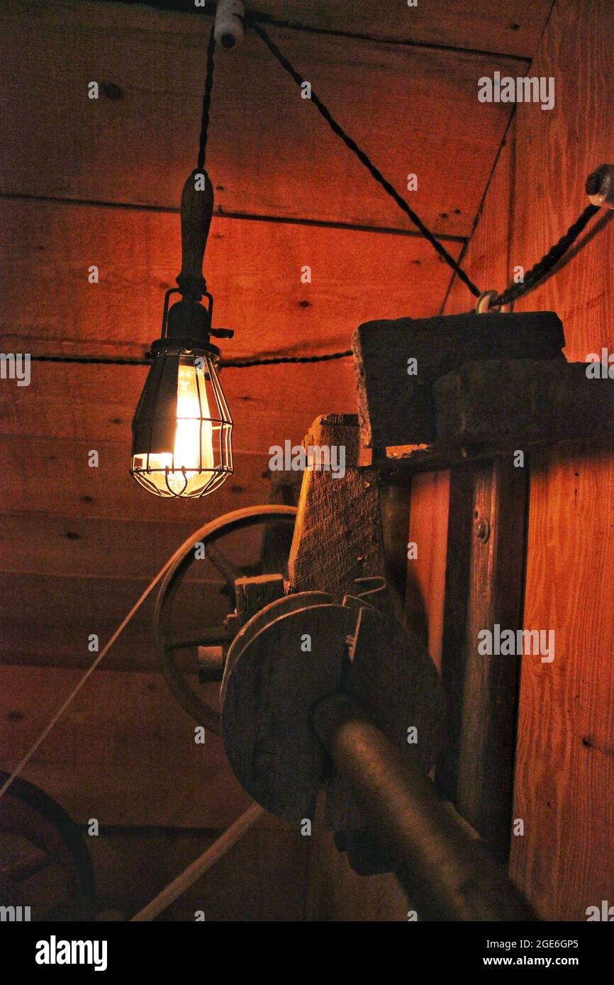 Old tool shed with vintage tools and a dim light Stock Photo - Alamy