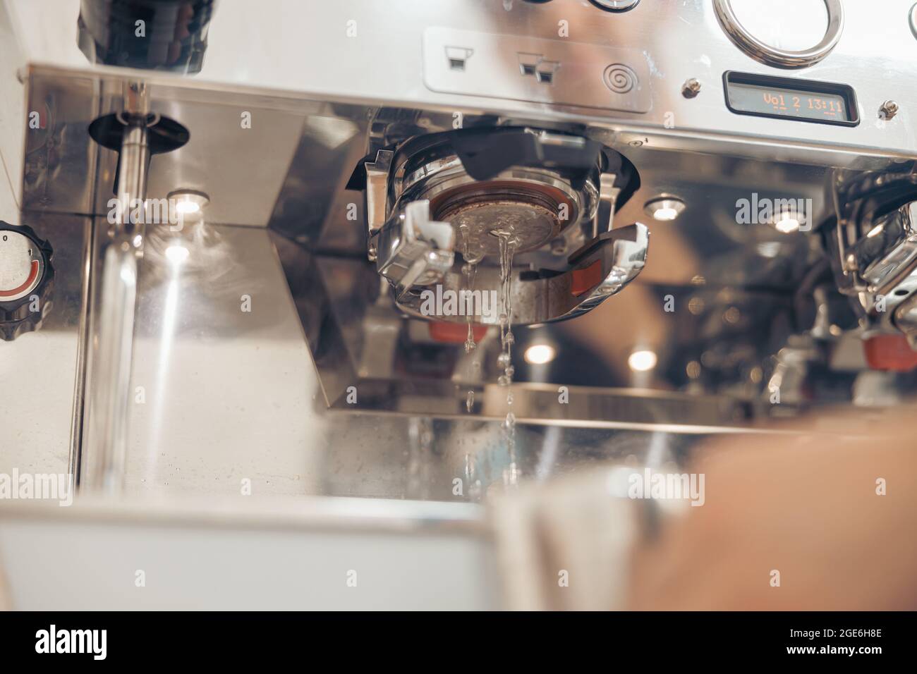 Professional coffee machine with dripping water in cafeteria Stock ...