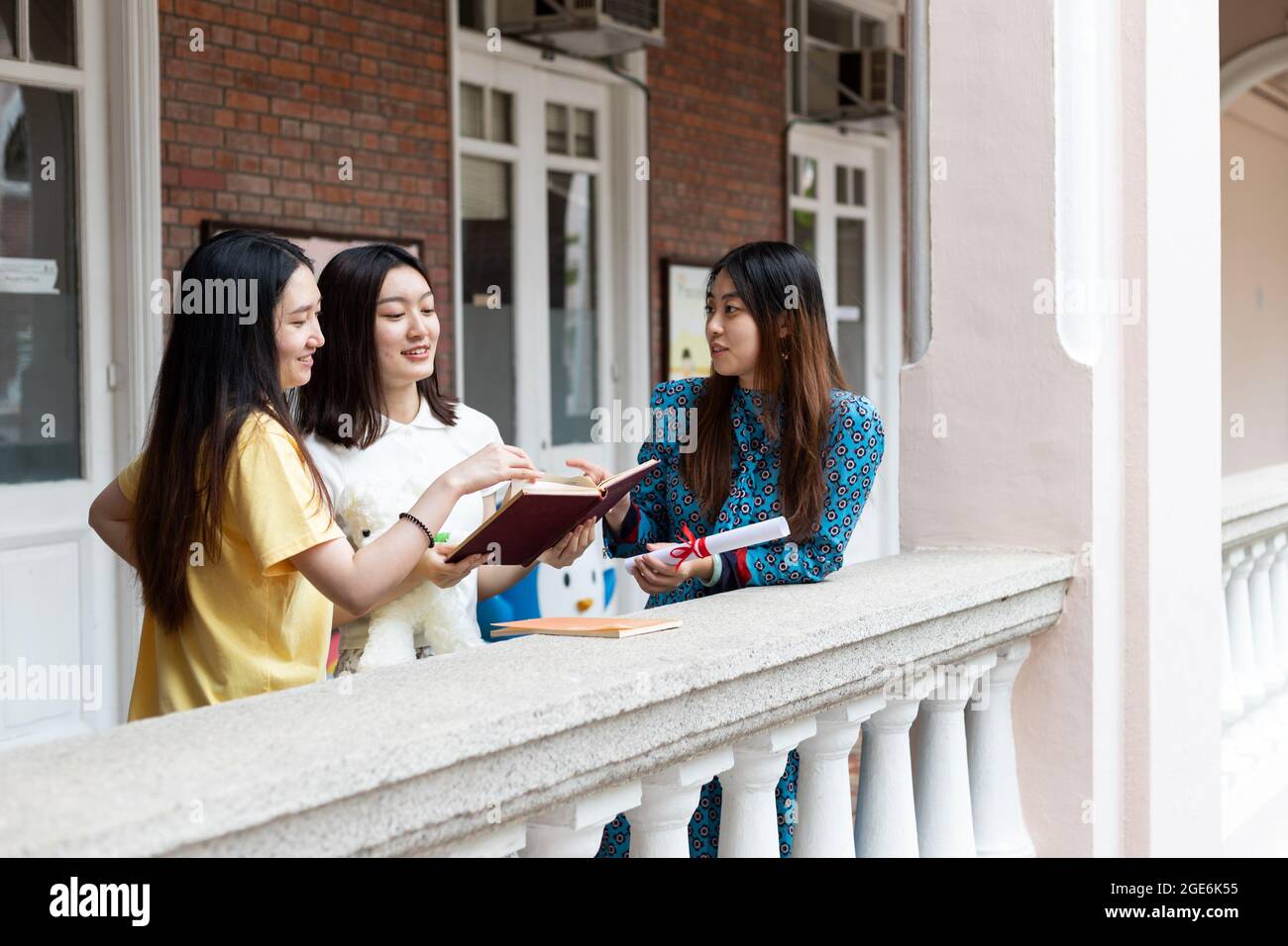 happy, cheerful, stylish Female university students chat with each ...