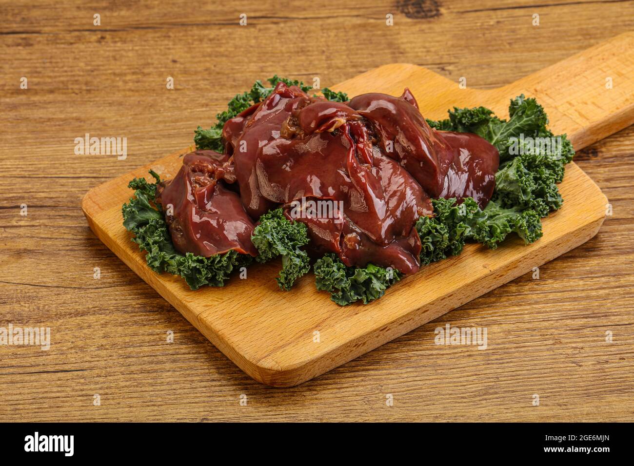 Raw chicken liver over board for cooking Stock Photo - Alamy