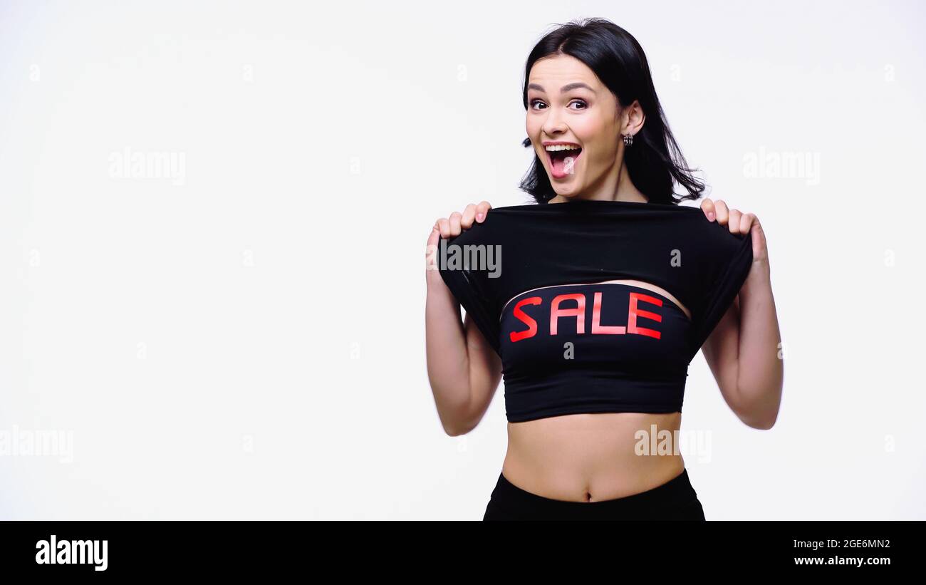 Excited woman in top with sale lettering isolated on white Stock Photo ...