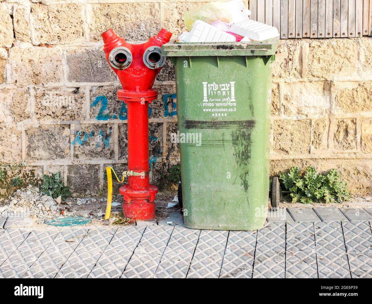 Trash can on fire hydrant hi-res stock photography and images - Alamy