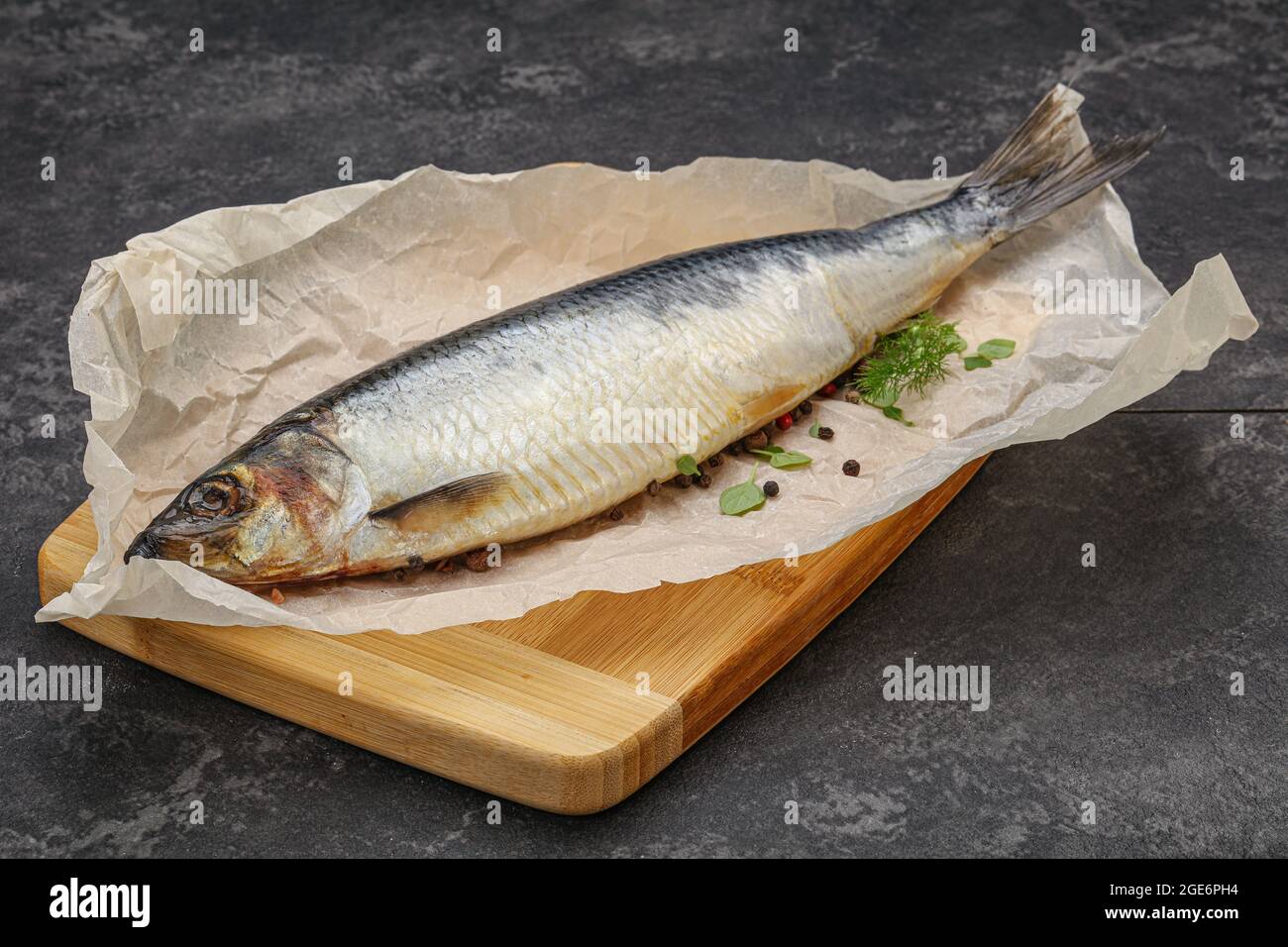 Salted Herring fish with pepper and spices Stock Photo - Alamy