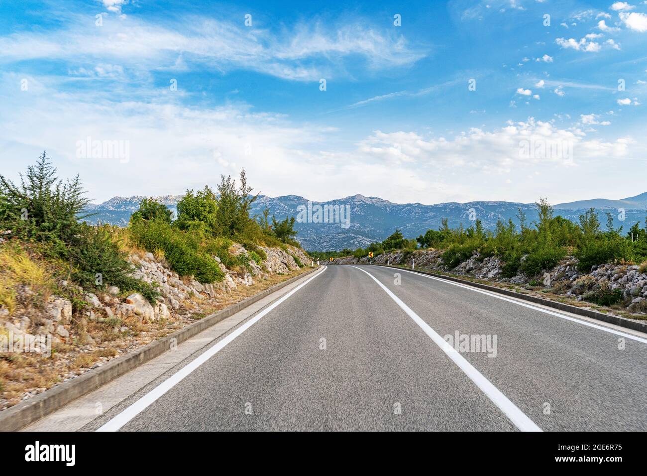 Scenic road. Road is surrounded by a magnificent natural landscape ...