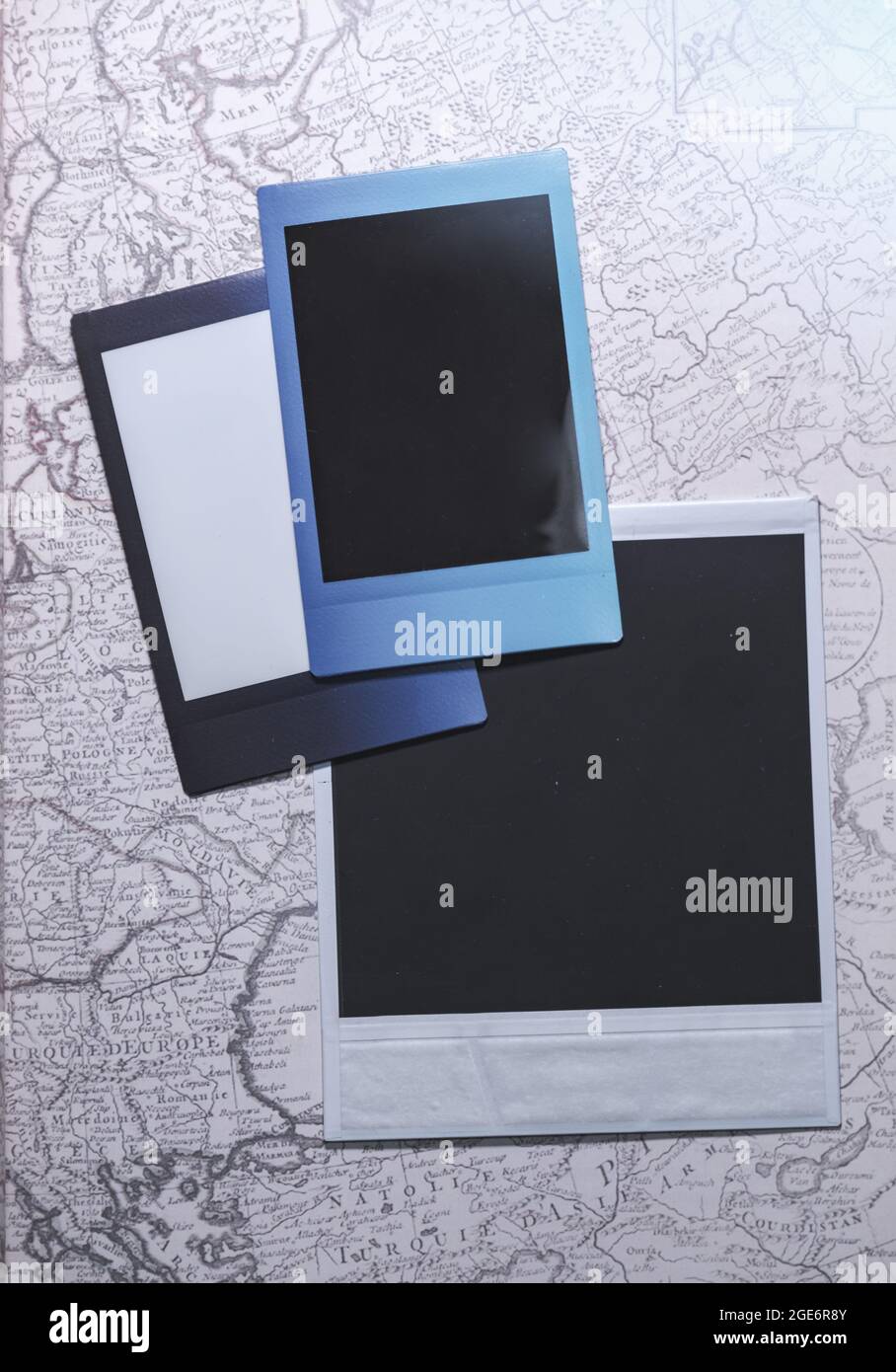 Blank photo frames on map background as template. Top View of photo ...