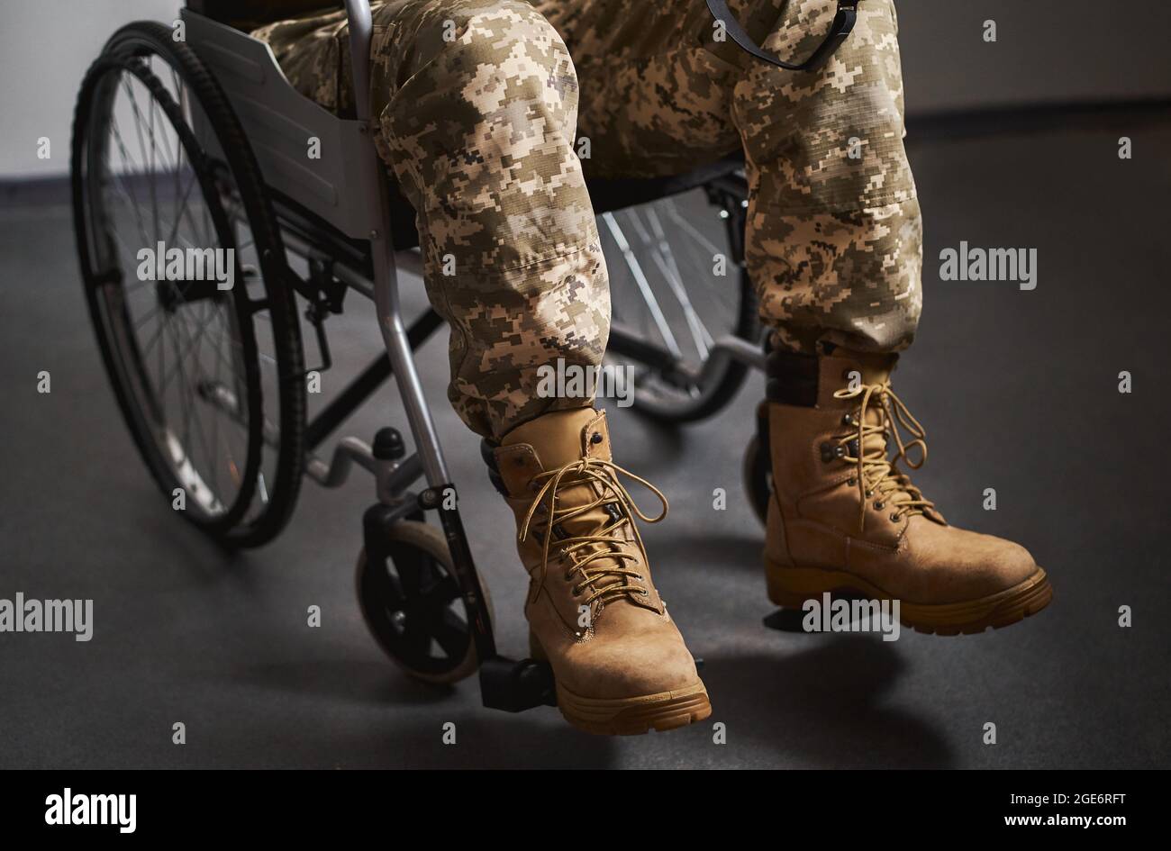 Low-section shot of a soldier sitting in a wheelchair Stock Photo - Alamy