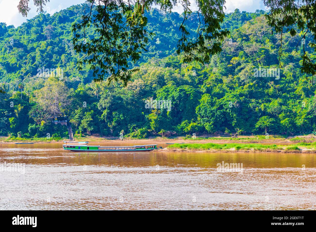 Panorama of the landscape Mekong river with boat and Luang Prabang city ...
