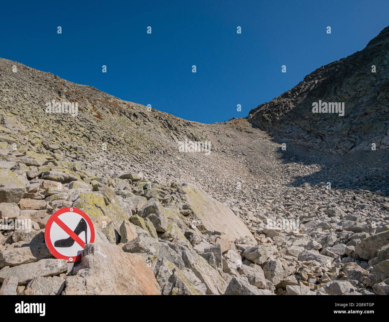 A funny prohibition sign for shoes with high heel in the mountains ...