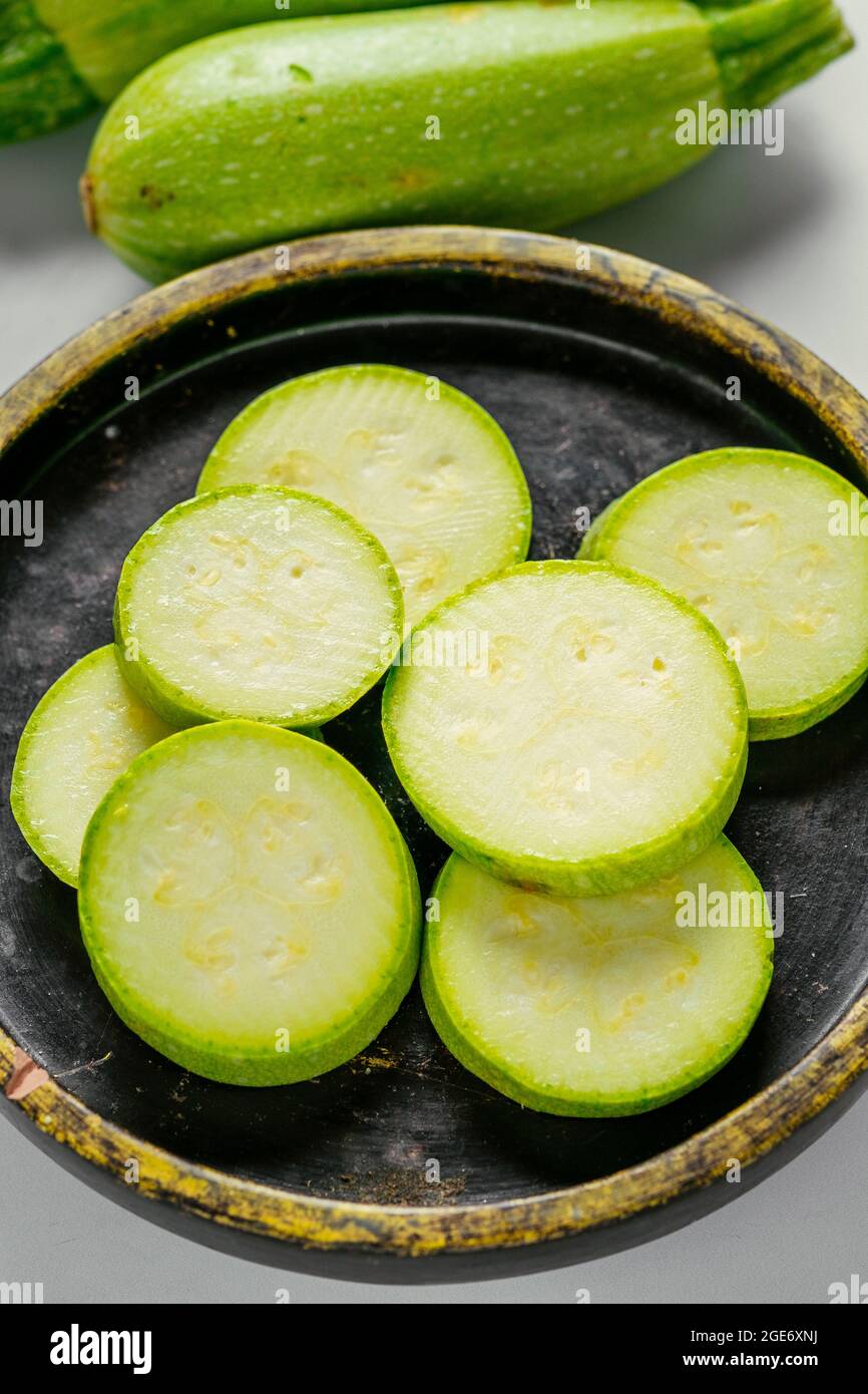 Bowl of Small Bright Green Fresh Zucchini or Courgettes – FOODPIX Stock ...