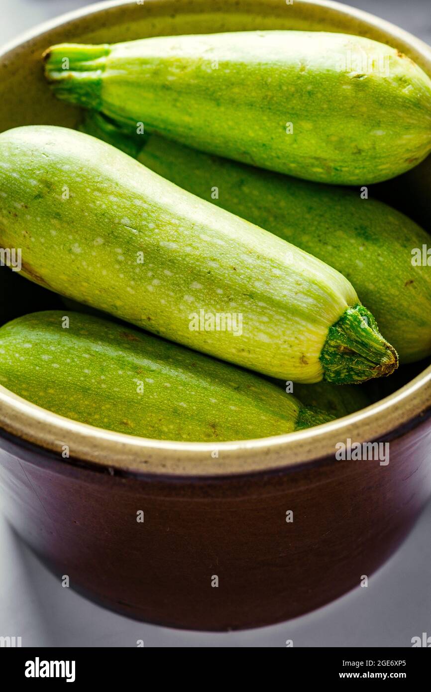 Bowl of Small Bright Green Fresh Zucchini or Courgettes – FOODPIX Stock ...